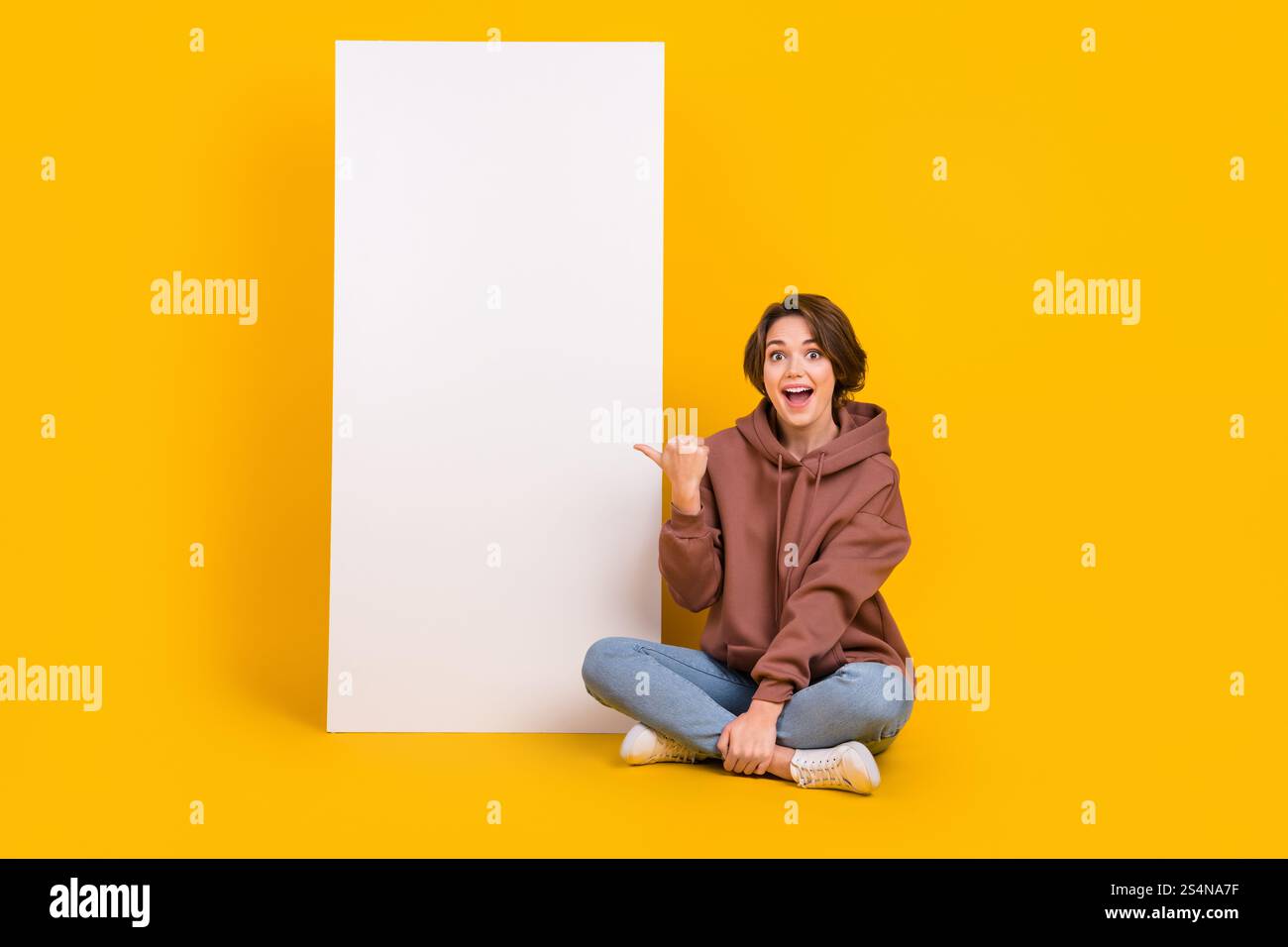 Full size photo of surprised girl direct finger phone display shocked ...