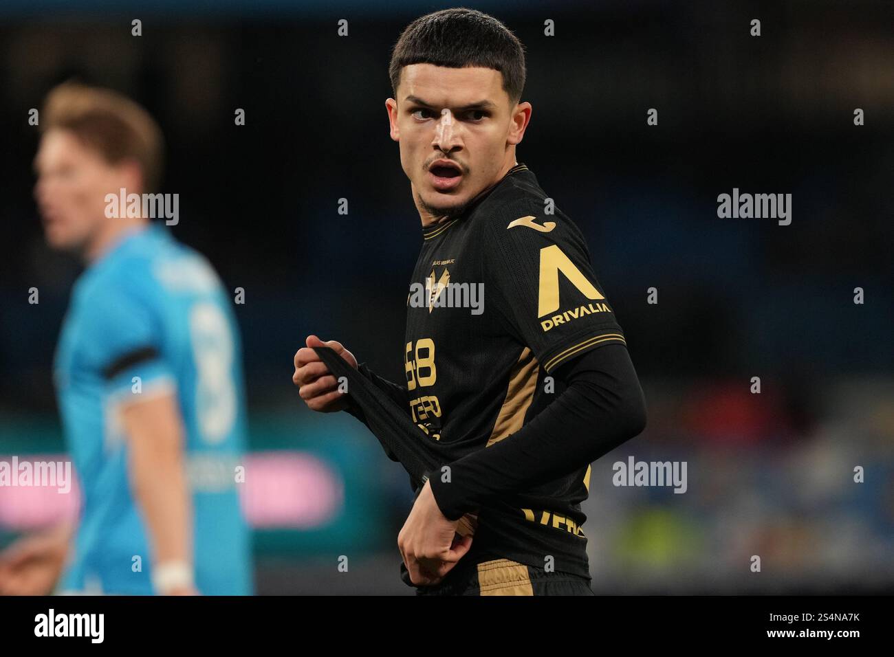 Naples, Italy. 12 Jan, 2025. Reda Belahyane of Hellas Verona during the ...