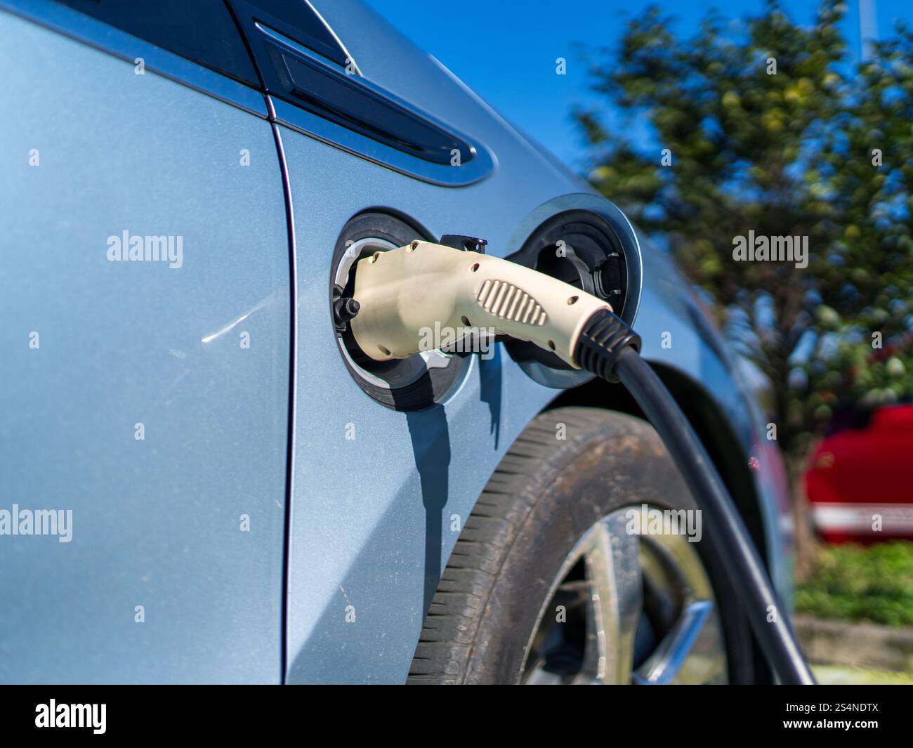 Electric car charging plug for ecofriendly transport, showing ...