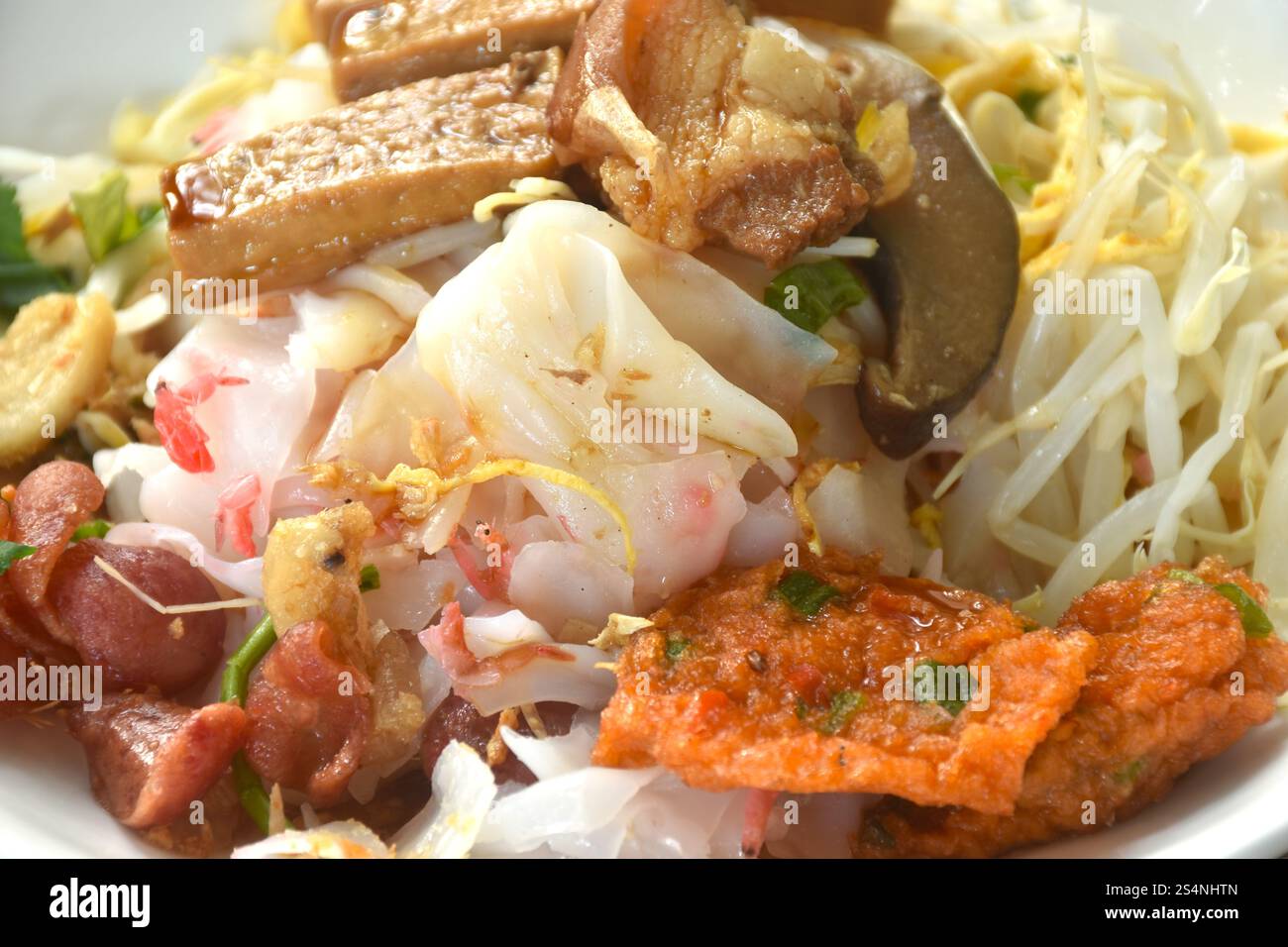 steamed large rice noodles topping slice fried Chinese sausage and ...