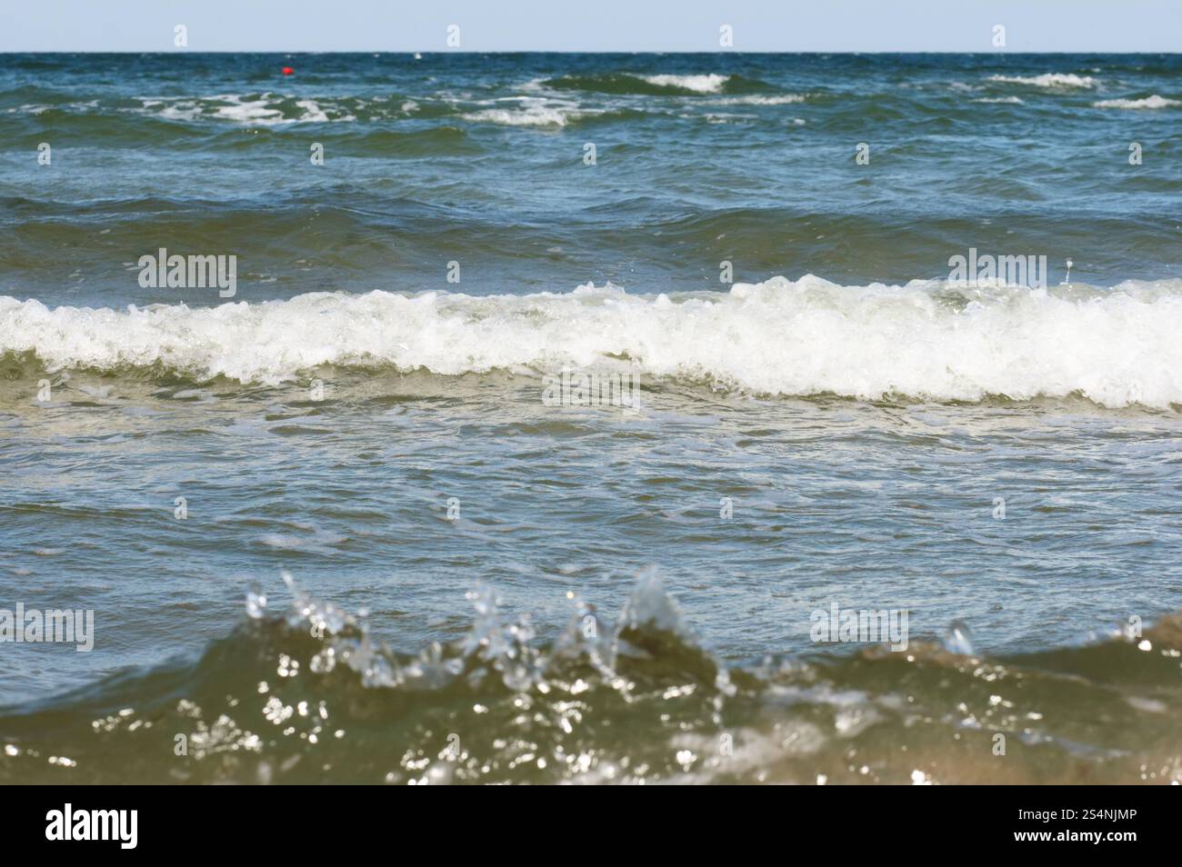 Surf waves and summer sea surface Stock Photo - Alamy