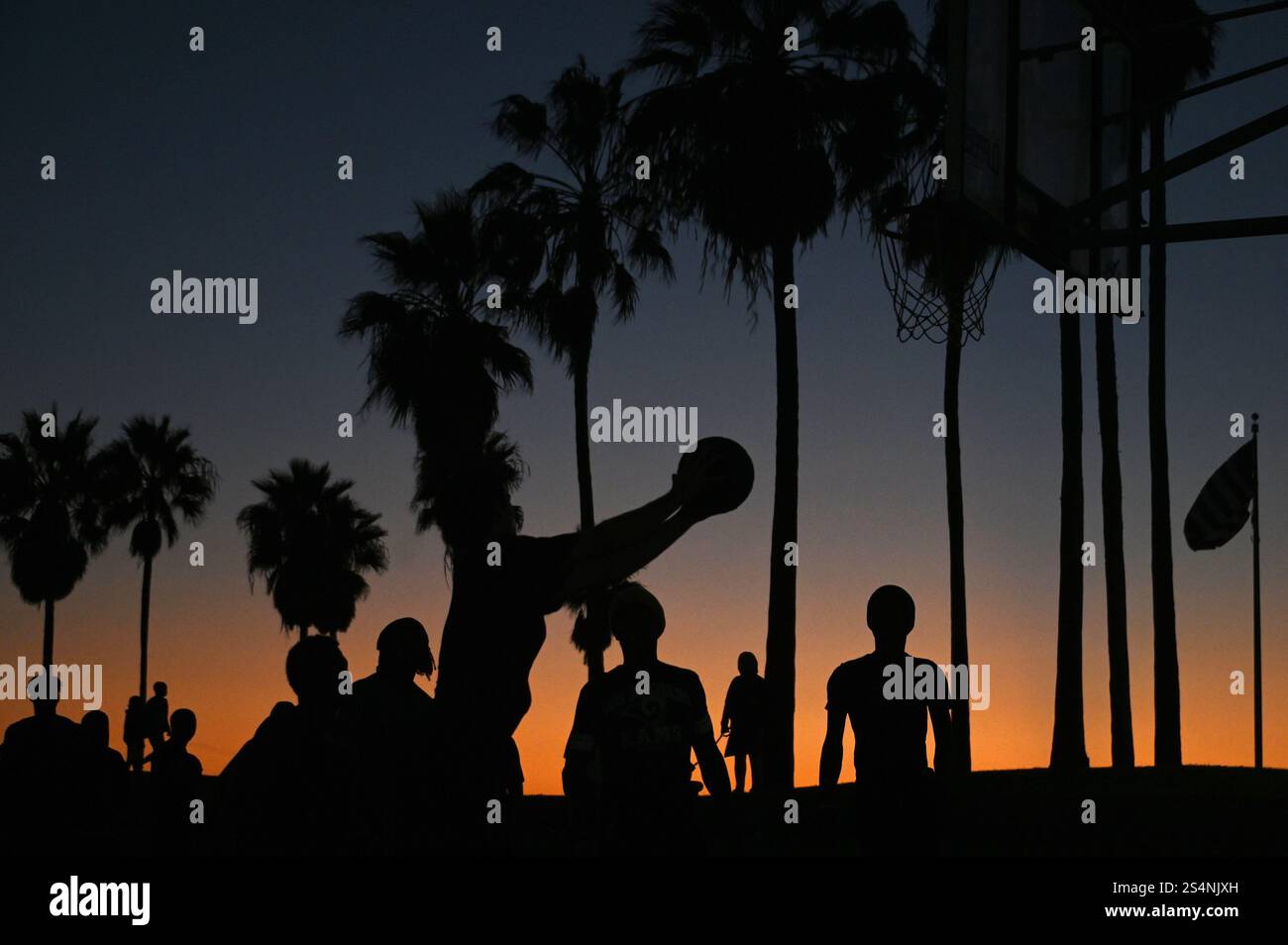 Sunset with basketball court on Venice Beach, Los Angeles, California ...