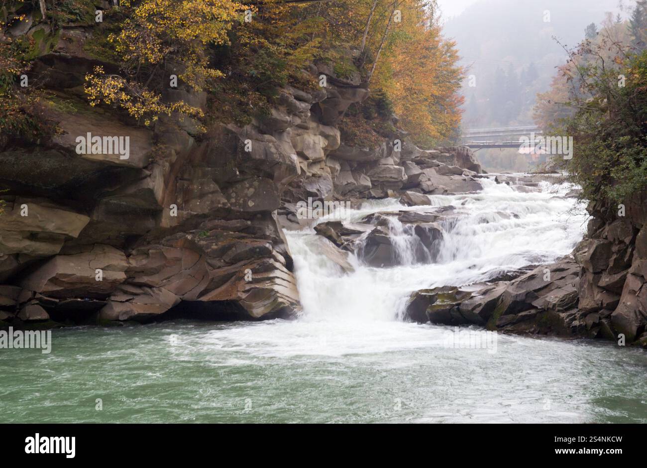 Autumn mountain river viev (with waterfall and bridge Stock Photo - Alamy