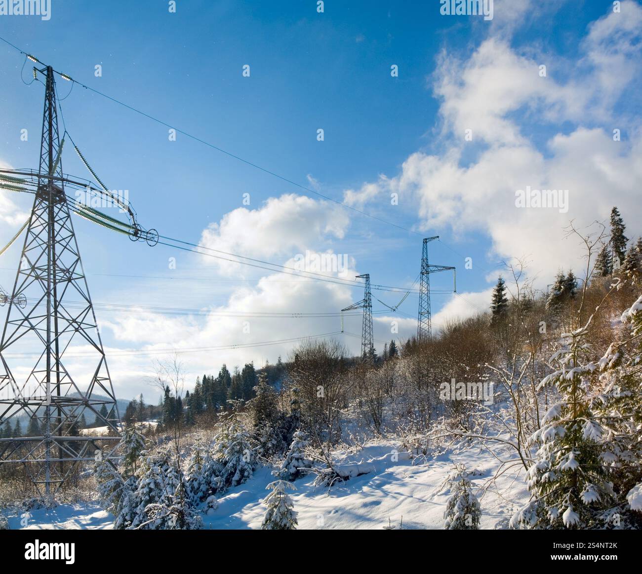 winter mountain landscape with high-voltage current line Stock Photo ...