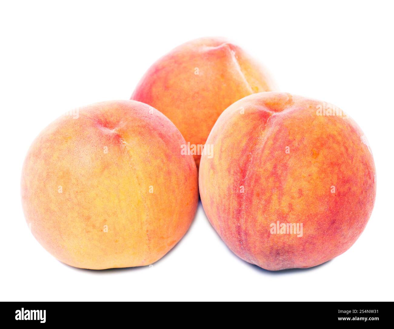 Three sweet juicy peaches isolated on white background Stock Photo - Alamy