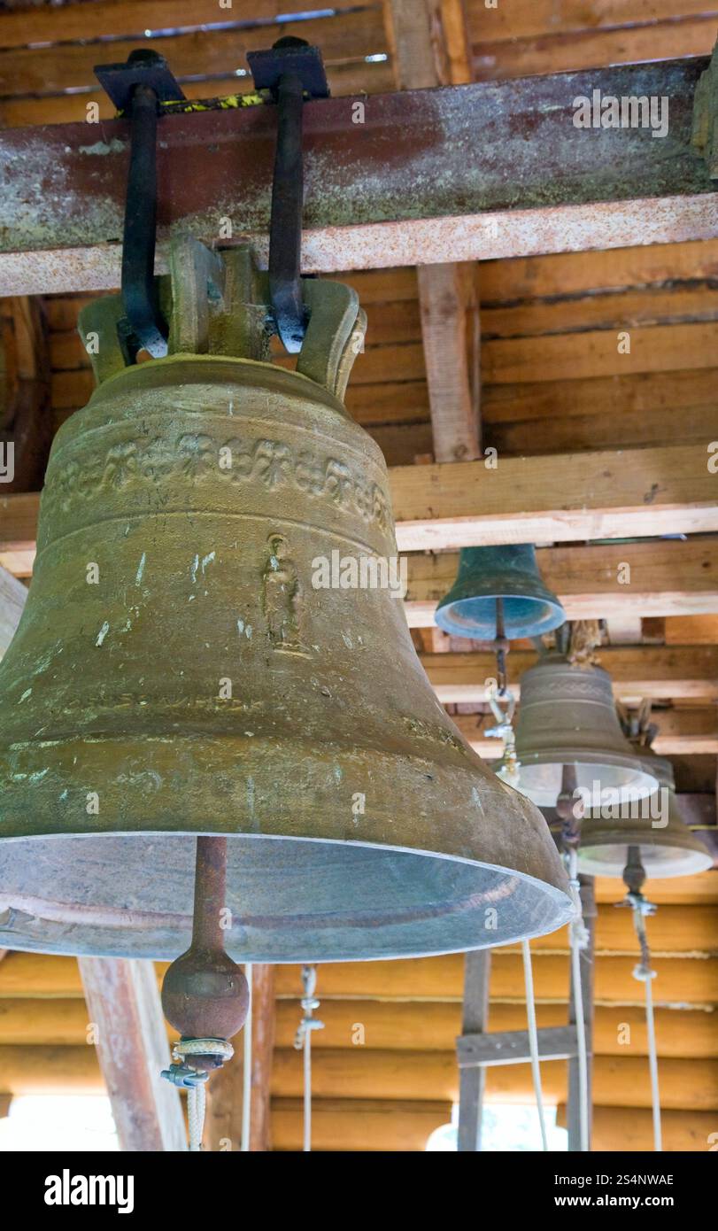 Church bells under the roof of christian monastery Stock Photo - Alamy
