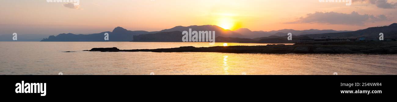 Summer sunset coastline and sun reflection in sea surface (Rhinoceros ...