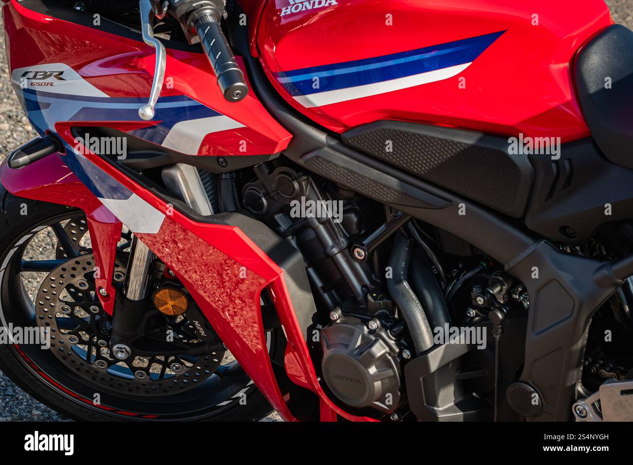 Red Honda Super Sport Motorcycle. A close up of a new Honda CBR 650R ...