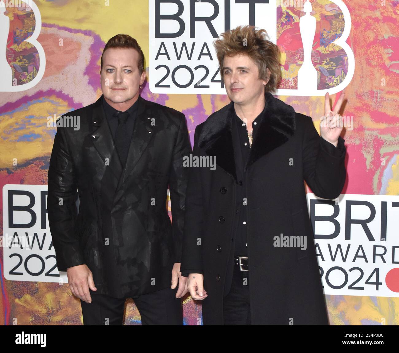 ***EDITORIAL USE ONLY*** Tré Cool and Billie Joe Armstrong of Green Day attends The BRIT Awards ...