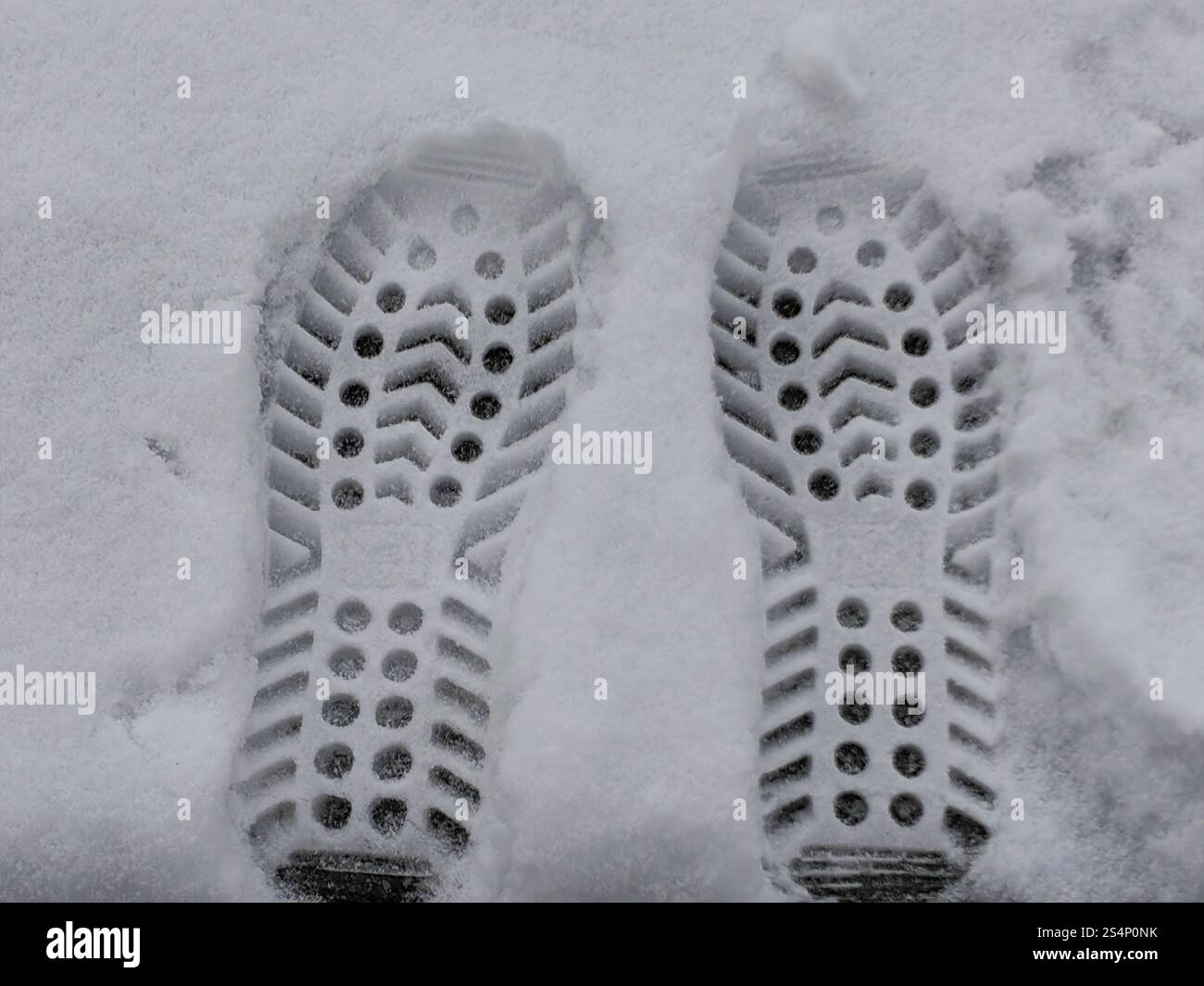 Footprints in the Snow: Winter Fun. Proof of existence Stock Photo - Alamy