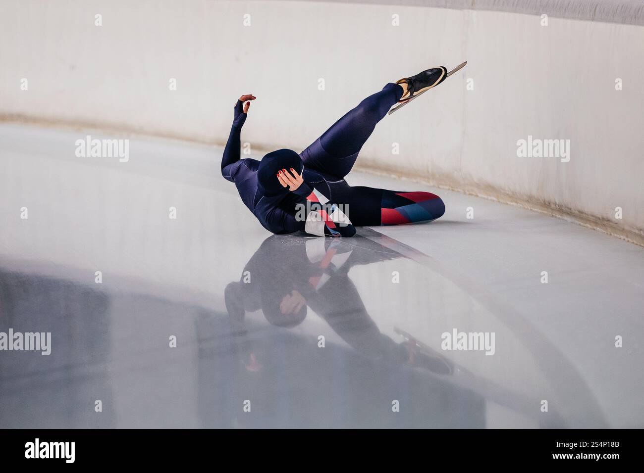 fall female speed skater at speed skating competition Stock Photo - Alamy