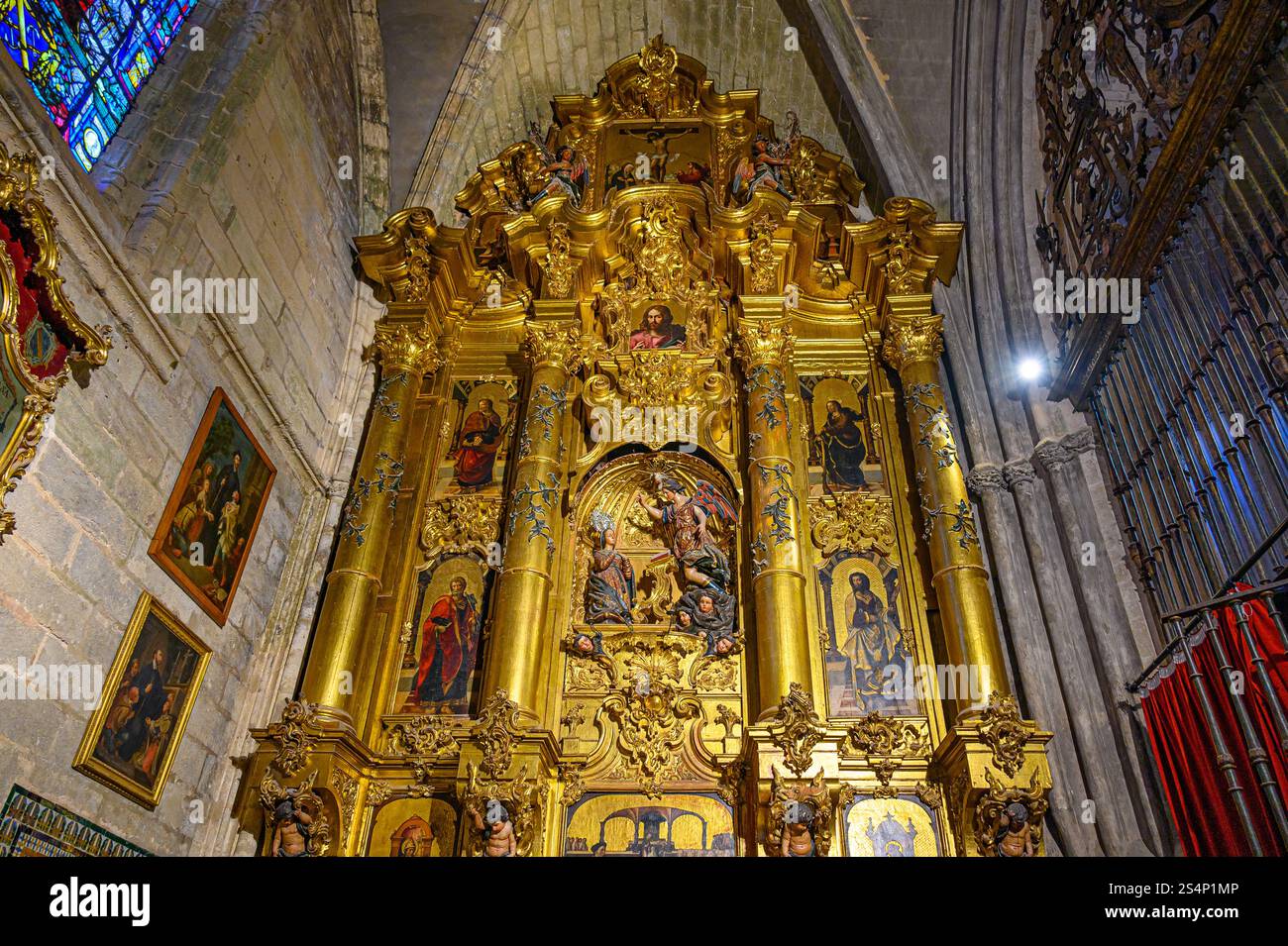 Golden altar featuring the image of the Virgin Mary at its center, set ...