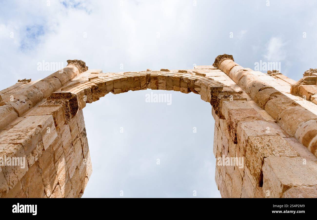 arch and column in antique city of Gerasa Jerash in Jordan Stock Photo ...