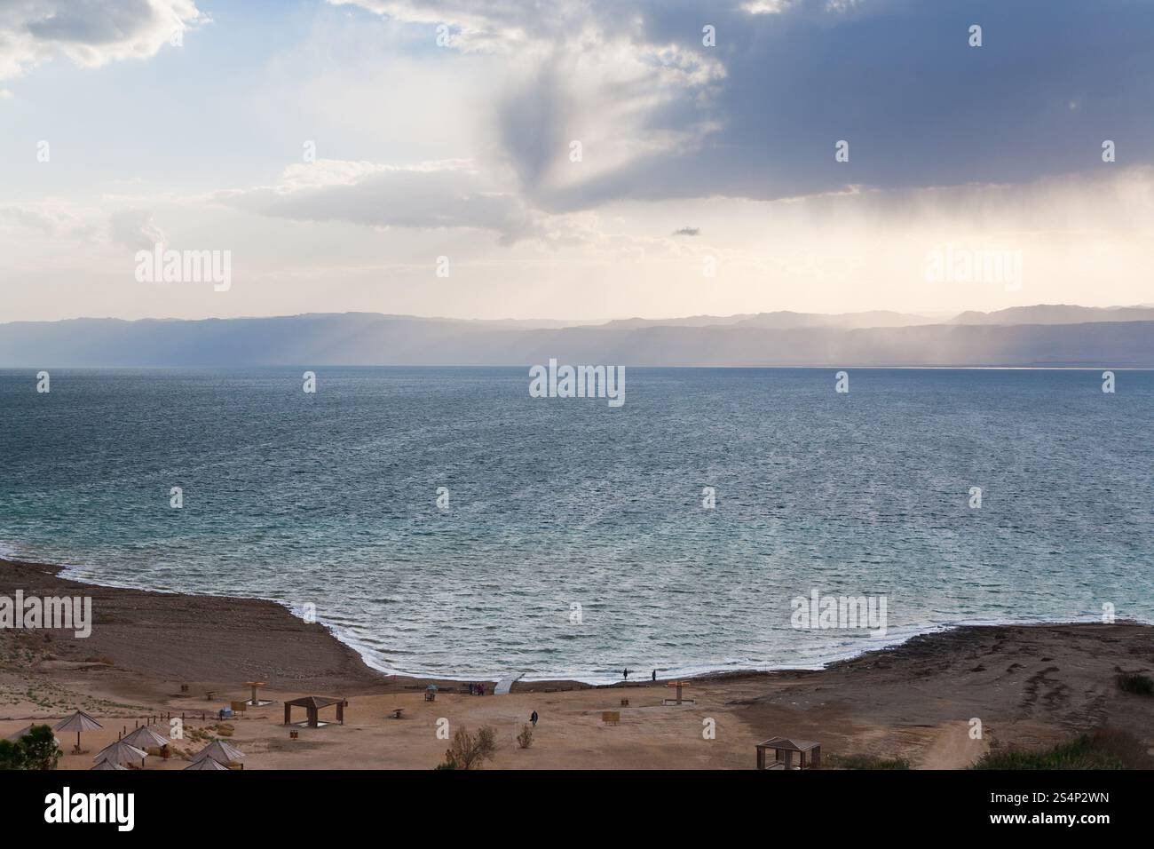sand beach on Dead Sea coast in Jordan in evening Stock Photo - Alamy