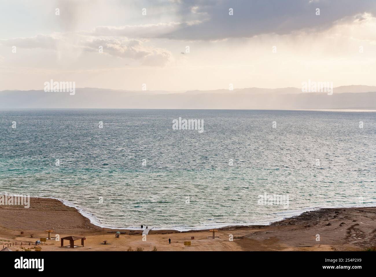sand beach on Dead Sea coast in Jordan in evening Stock Photo - Alamy