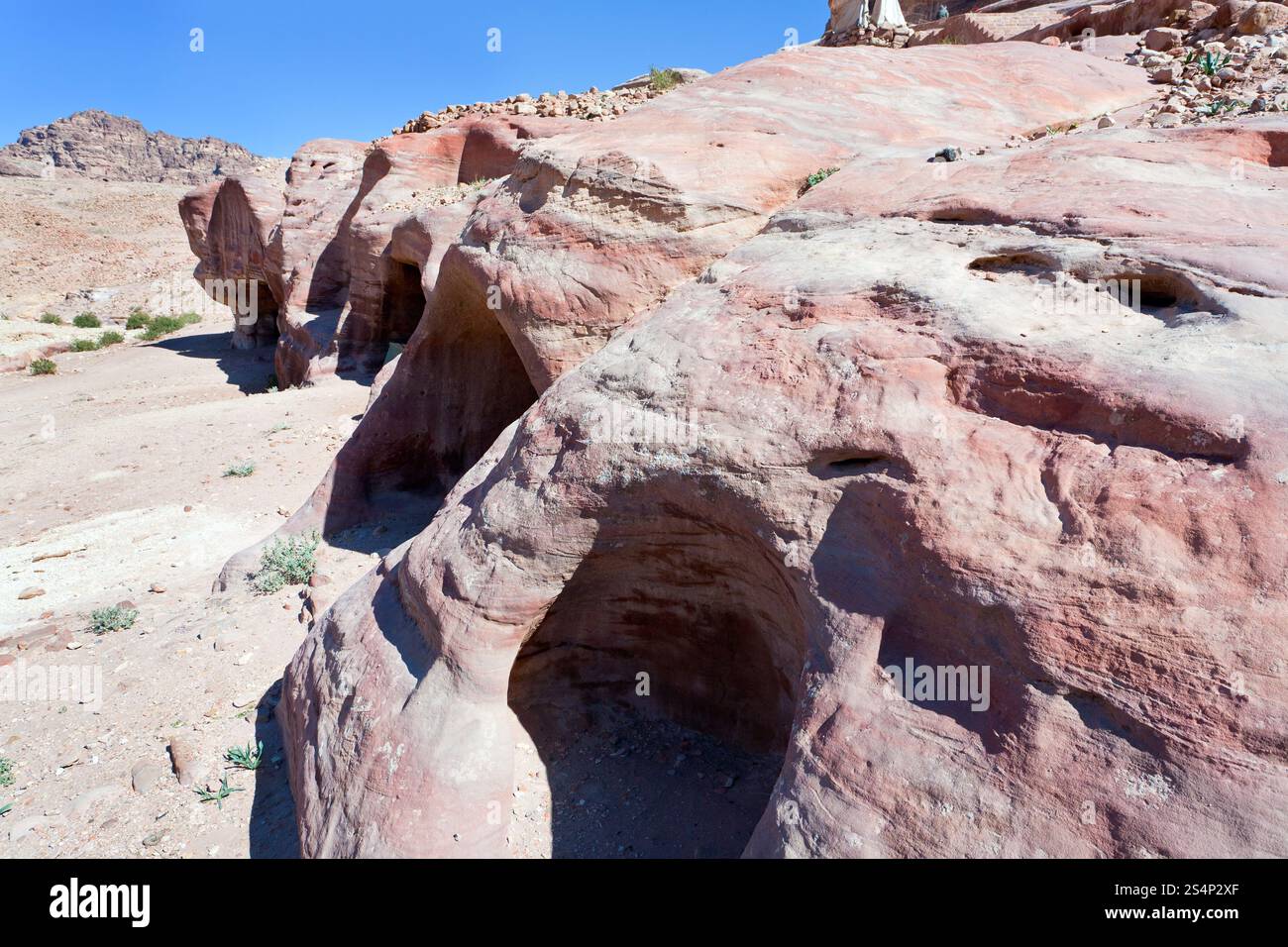 ancient stone cave tomb in Petra, Jordan Stock Photo - Alamy