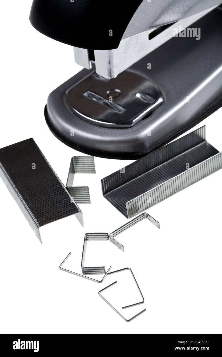 staples and office stapler close-up Stock Photo - Alamy