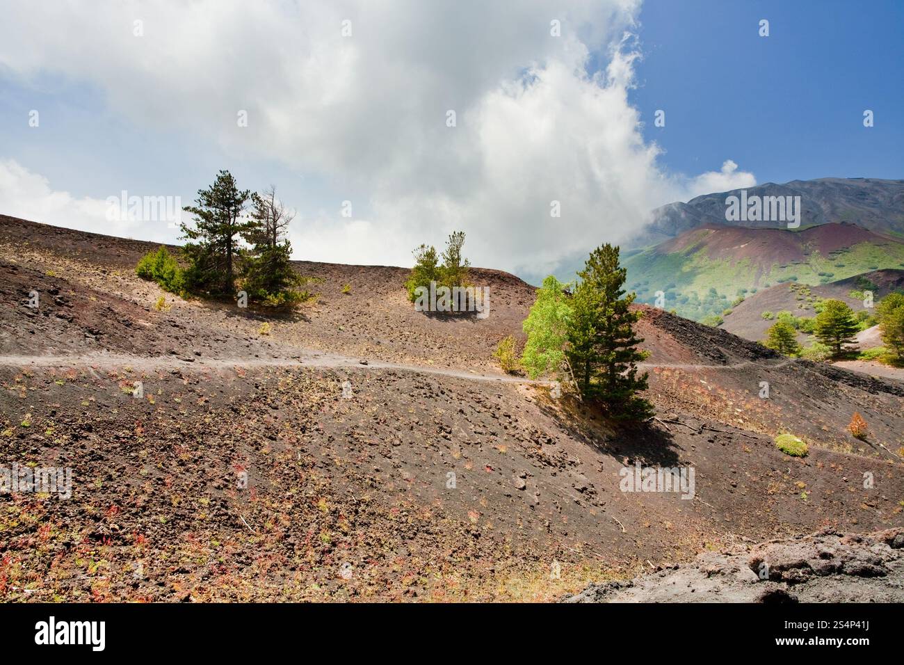 mountain path in clinker ground on volcano Etna, Sicily Stock Photo - Alamy