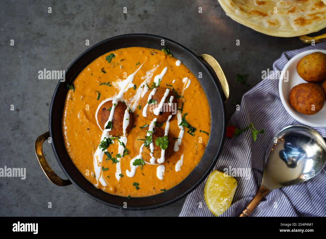 Malai Kofta served with Paratha |Indian vegetarian creamy curry with ...