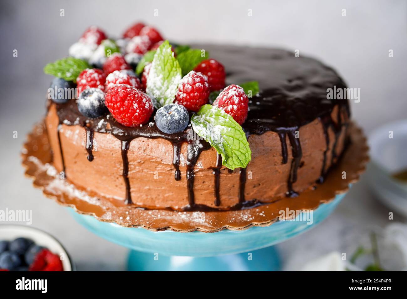 Homemade vanilla layered sponge cake with chocolate buttercream ...