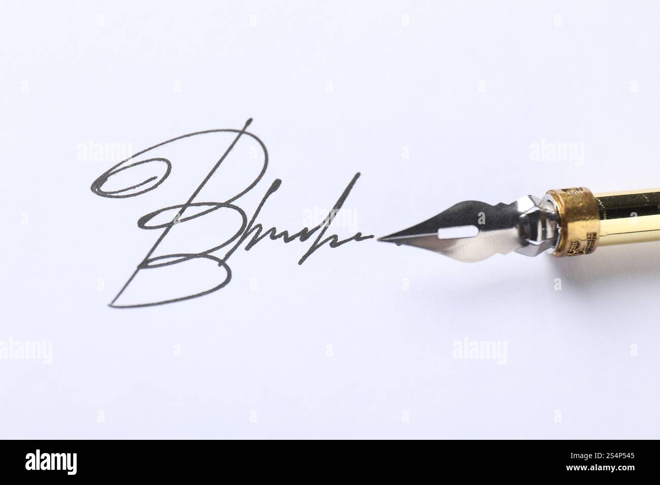 Fountain pen and signature on white paper, closeup Stock Photo - Alamy