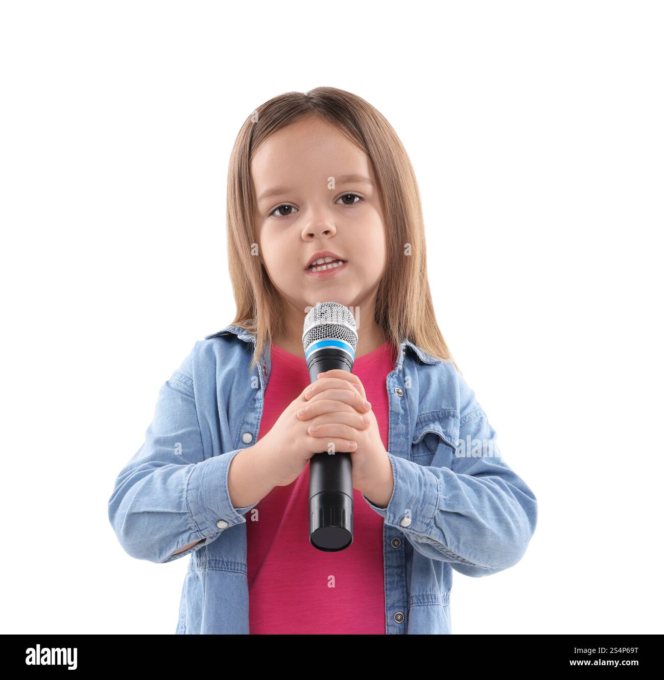 Cute girl with microphone singing on white background Stock Photo - Alamy