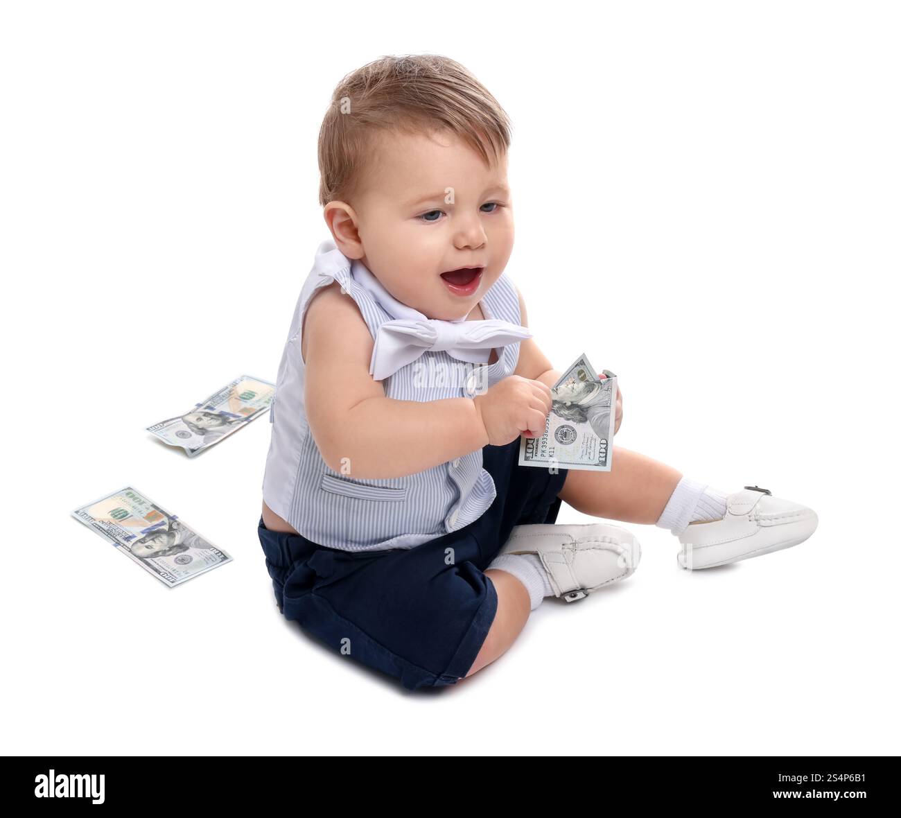 Little baby with money on white background Stock Photo - Alamy