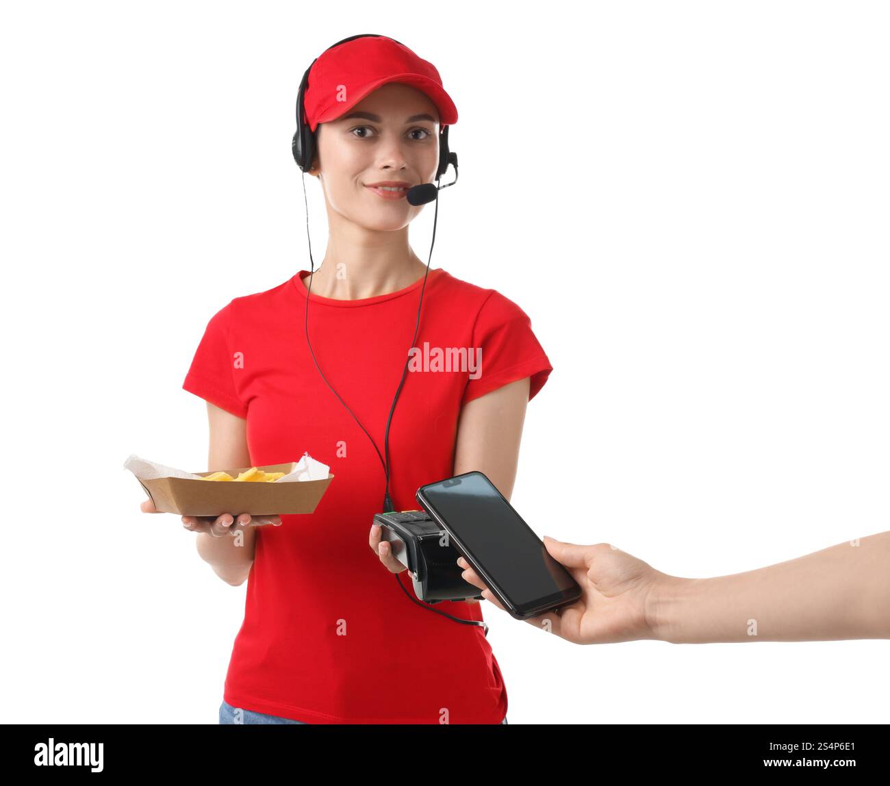 Fast-food worker taking payment from client via terminal on white ...