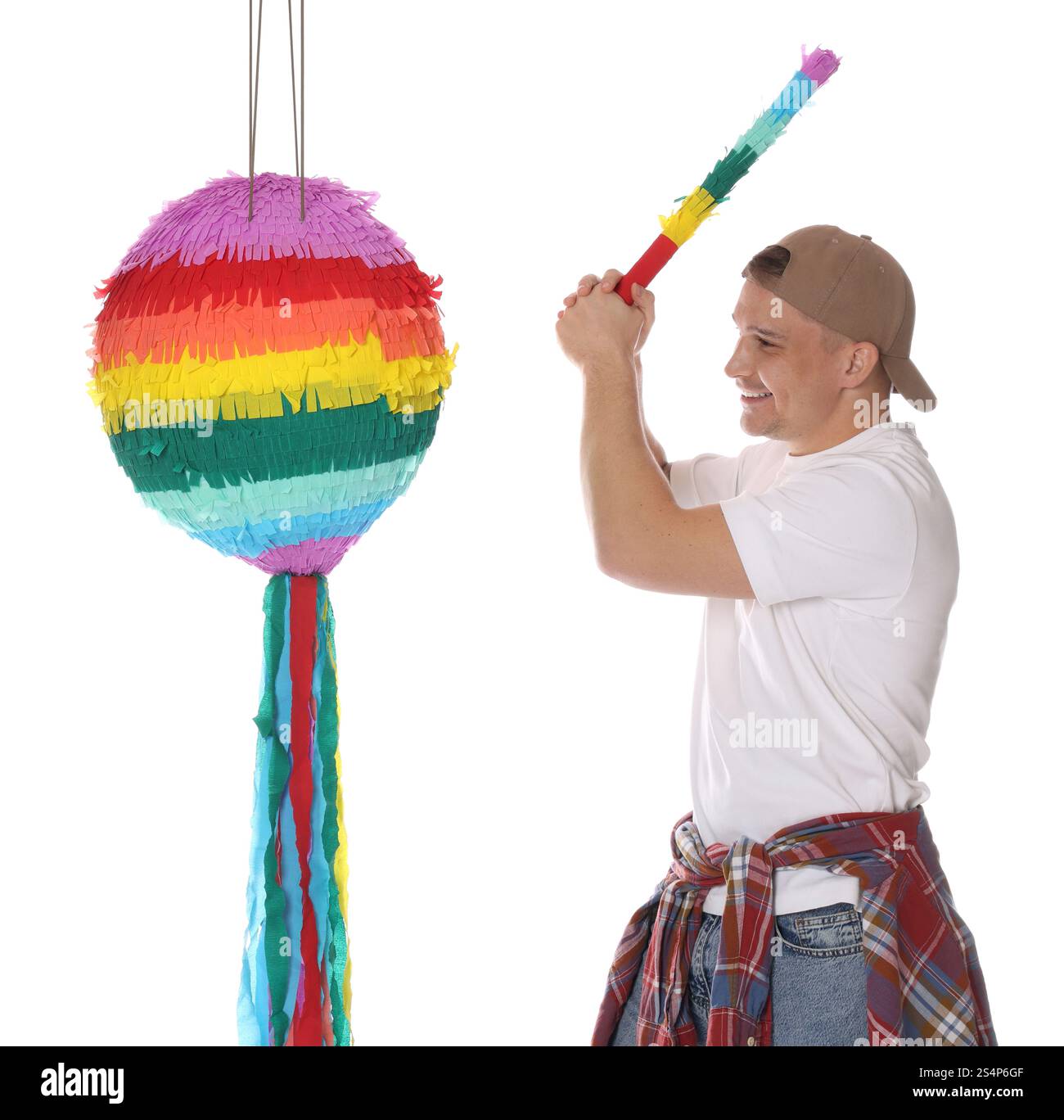 Happy man breaking pinata on white background Stock Photo - Alamy
