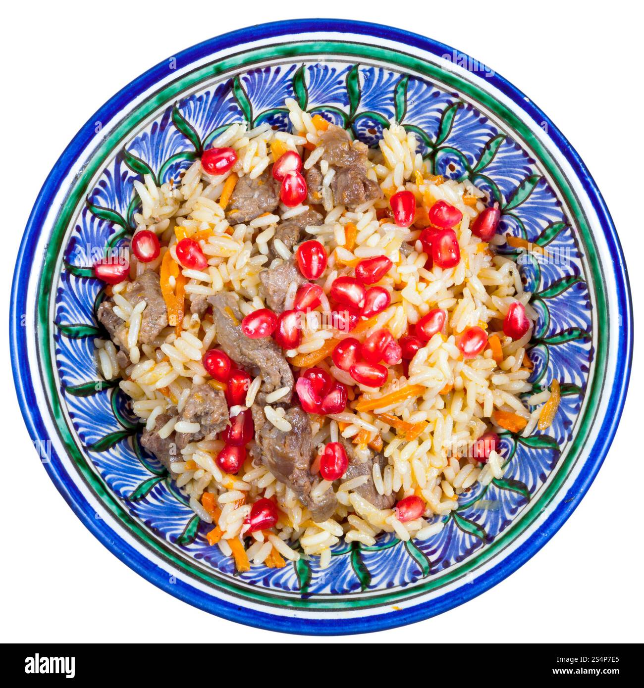 top view on traditional asian pilaf with pomegranate seeds in ceramic ...