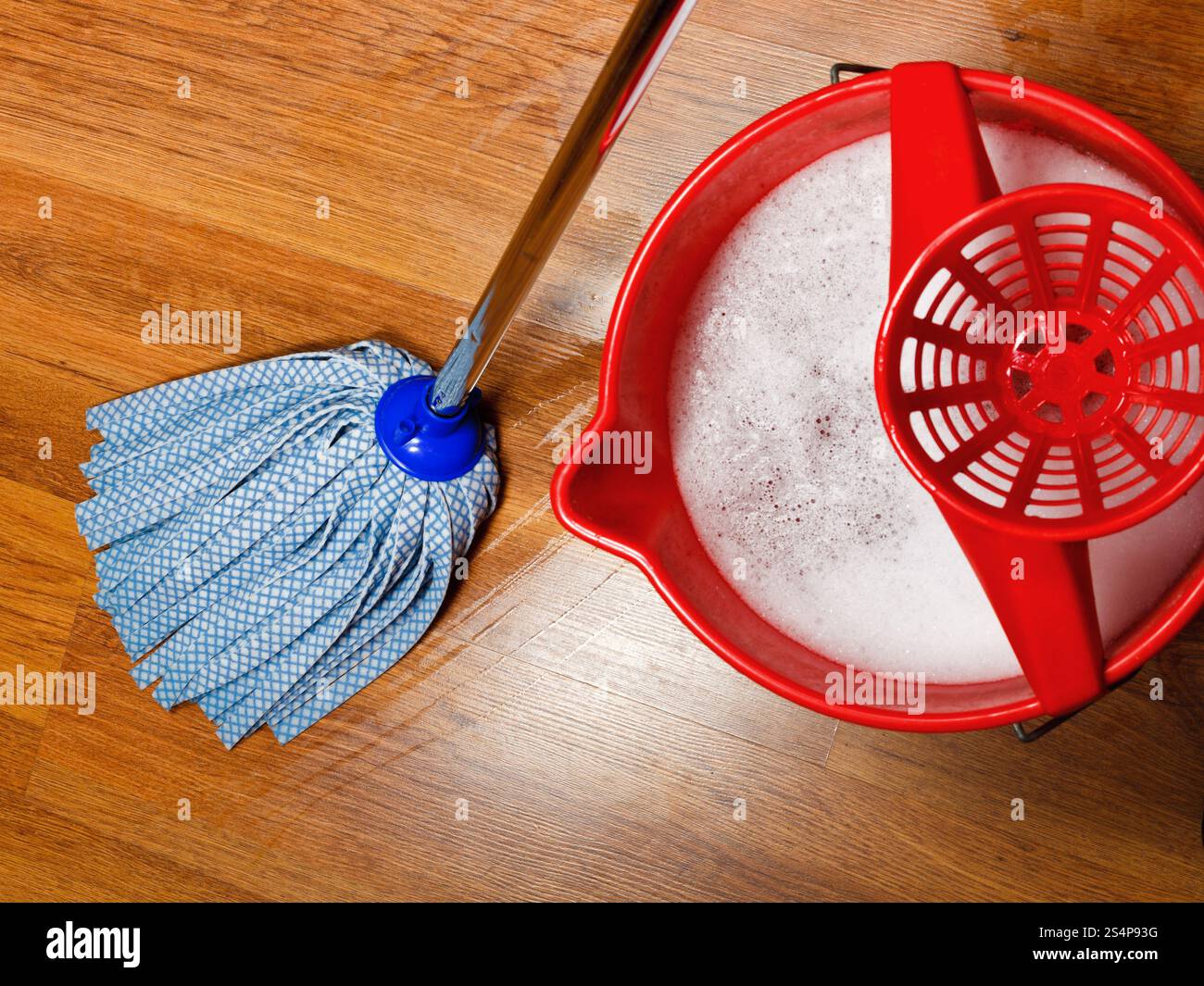 top view of mop and bucket with water for cleaning floors Stock Photo ...