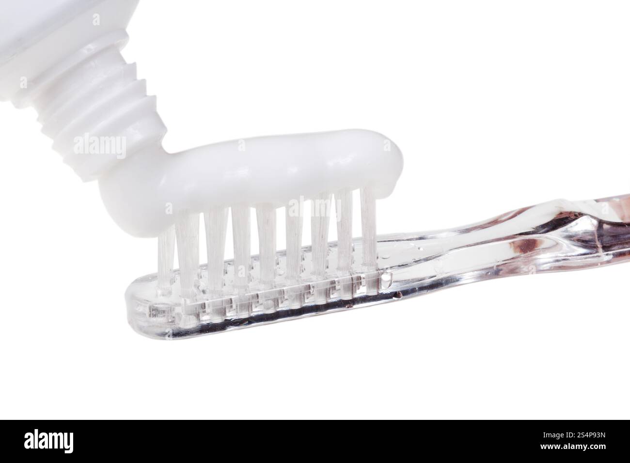 toothbrush and squeezed paste from tube close up isolated on white ...