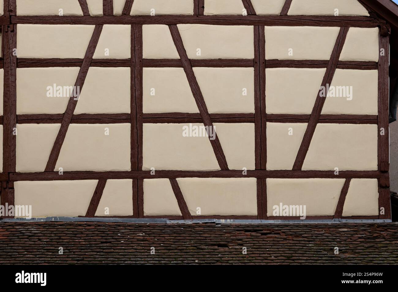 Traditional half-timbered wall of Alsatian house with vertical and ...