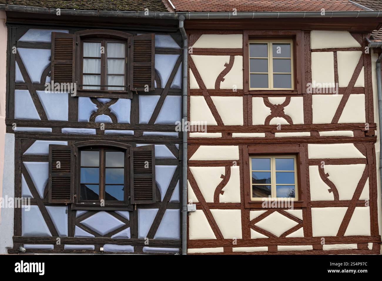 Traditional half-timbered wall of Alsatian house with creme and blue ...