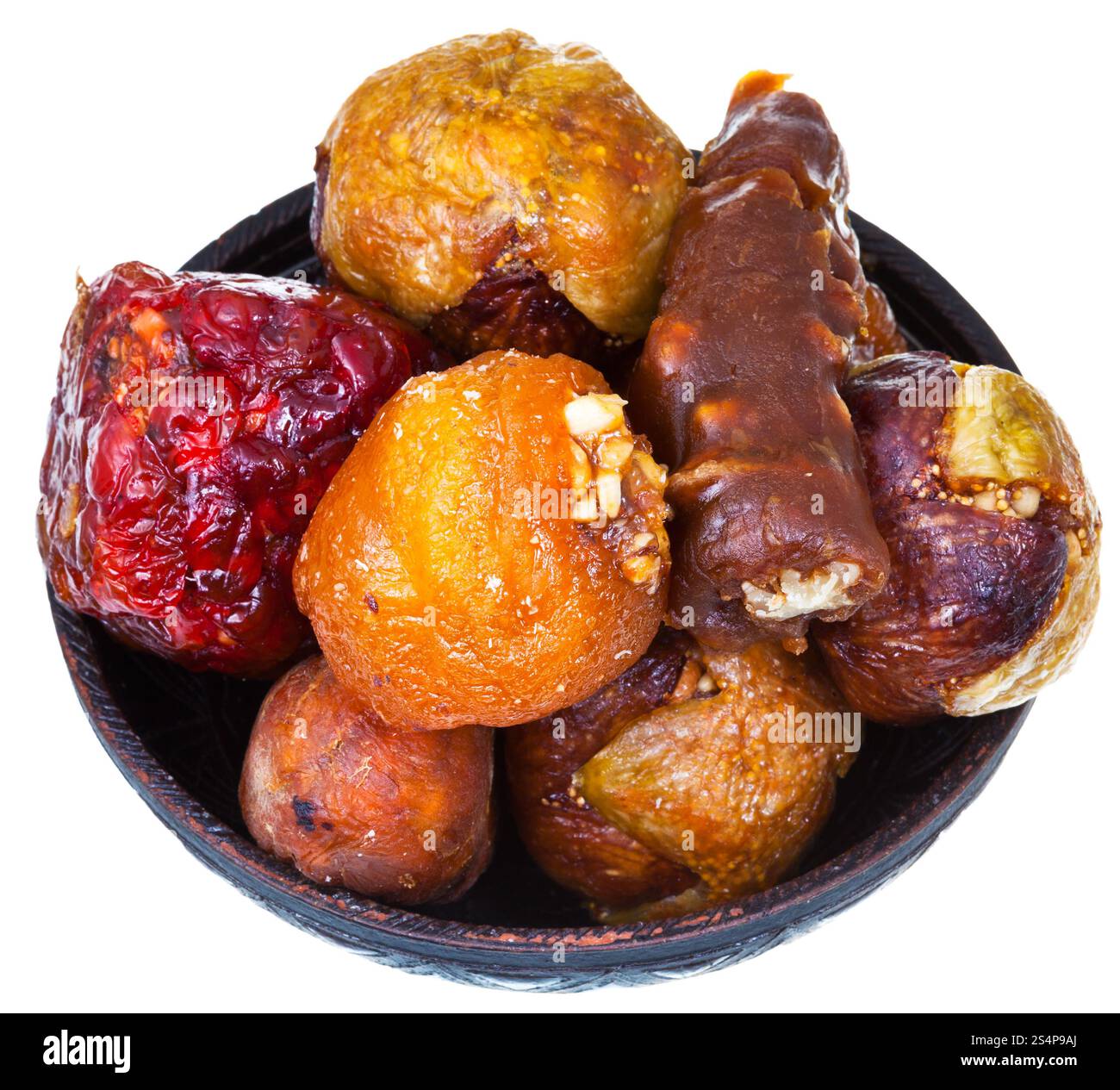 armenian candied stuffed fruits in ceramic bowl isolated on white ...