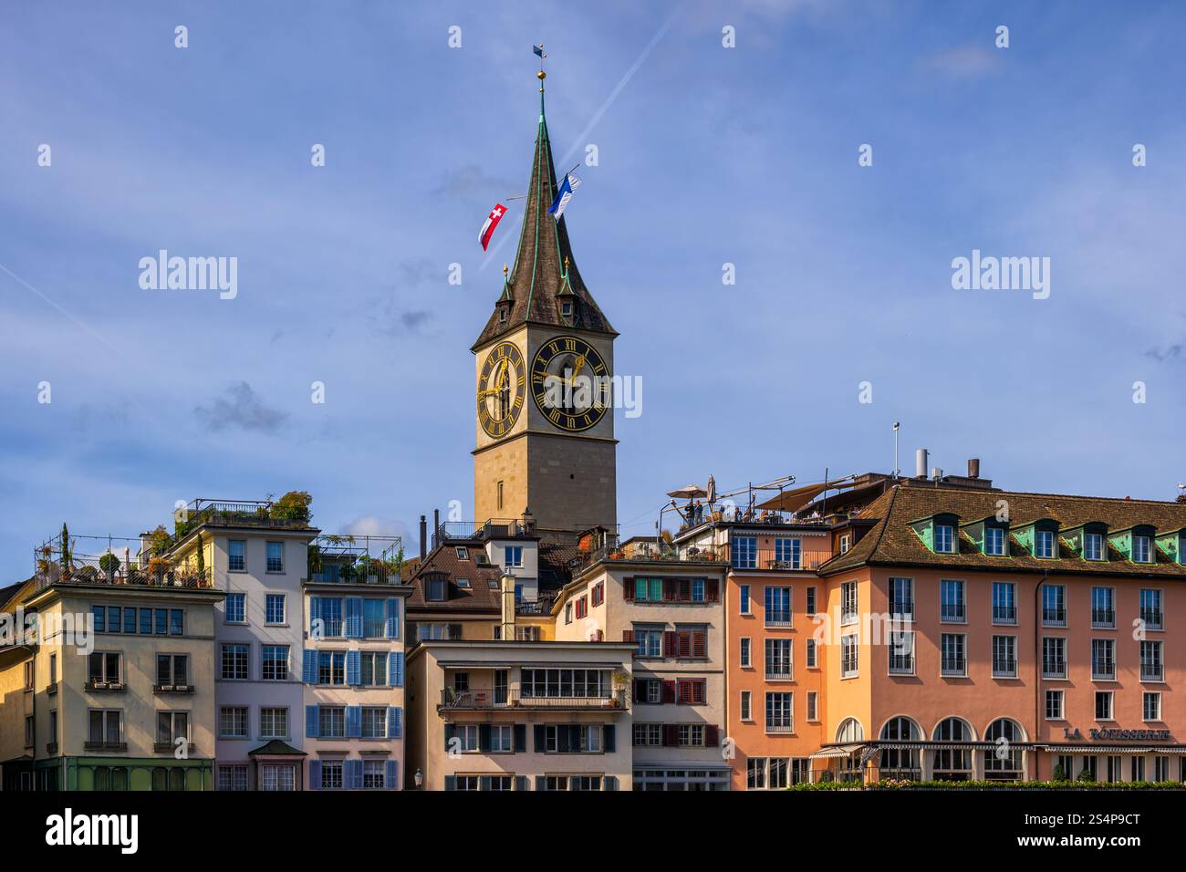 St. Peter's Church clock tower in Old Town skyline of Zurich city in ...