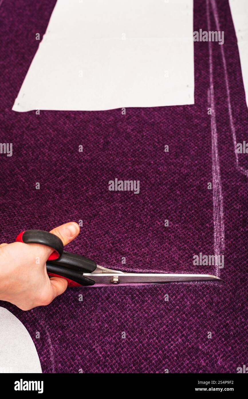 tailor cut textile along soap lines on pattern cutting Stock Photo - Alamy