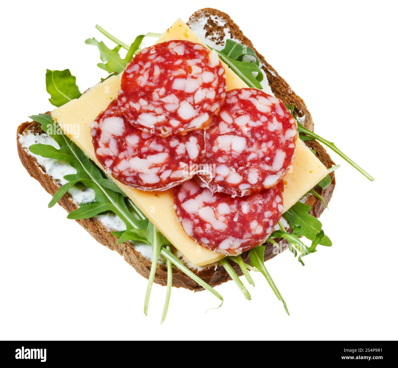 sandwich from rye bread, salami, cheese and rocket salad isolated on ...