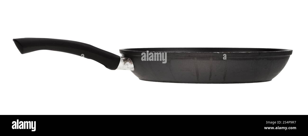 side view of big black frying pan isolated on white background Stock ...