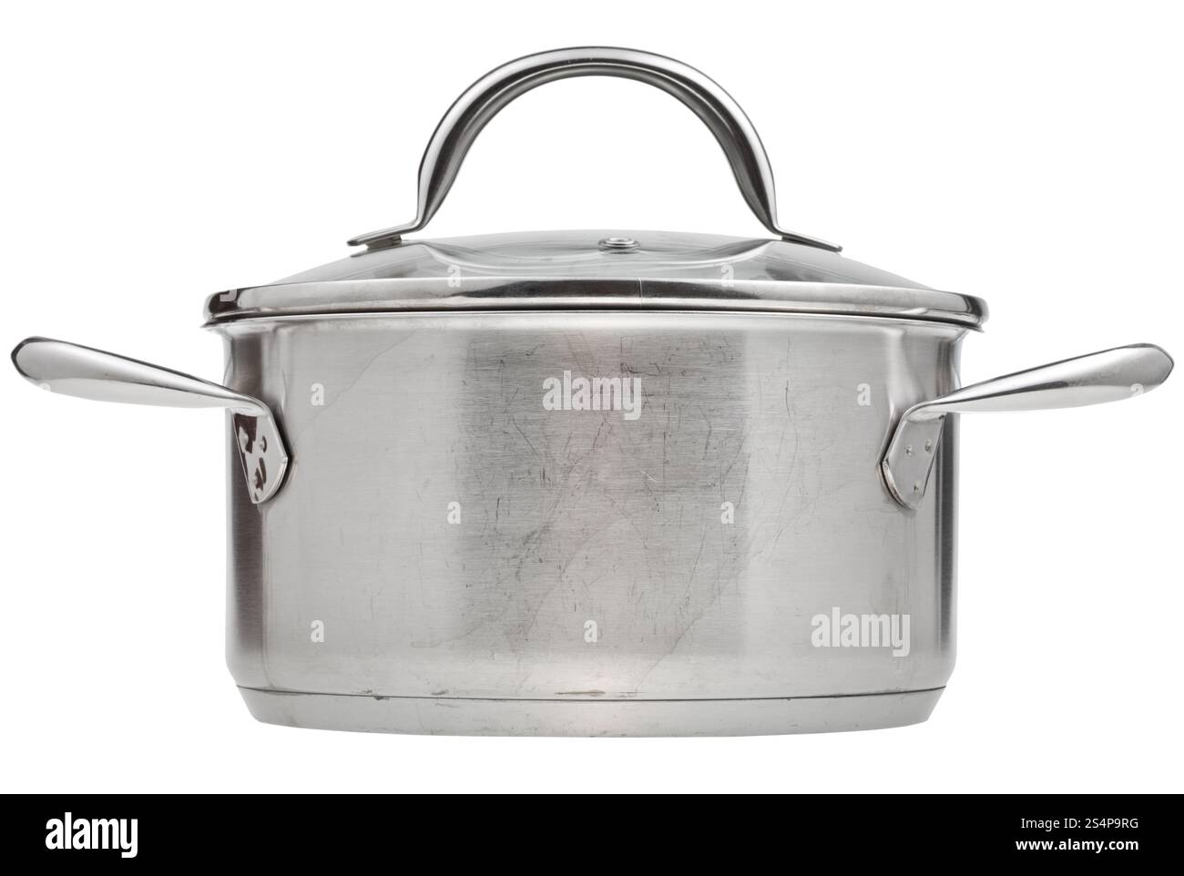 side view of small stainless steel saucepan covered by glass lid ...
