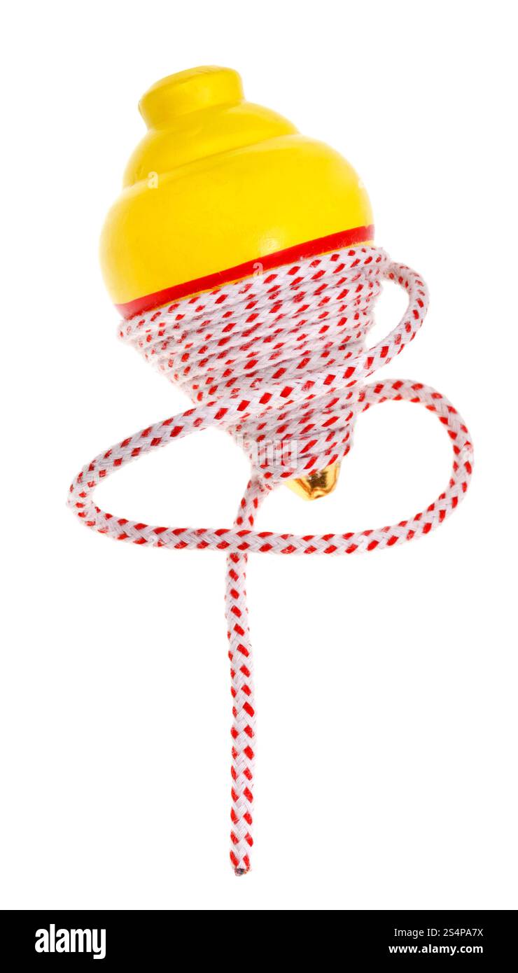 traditional spinning toy - trompo isolated on white background Stock ...