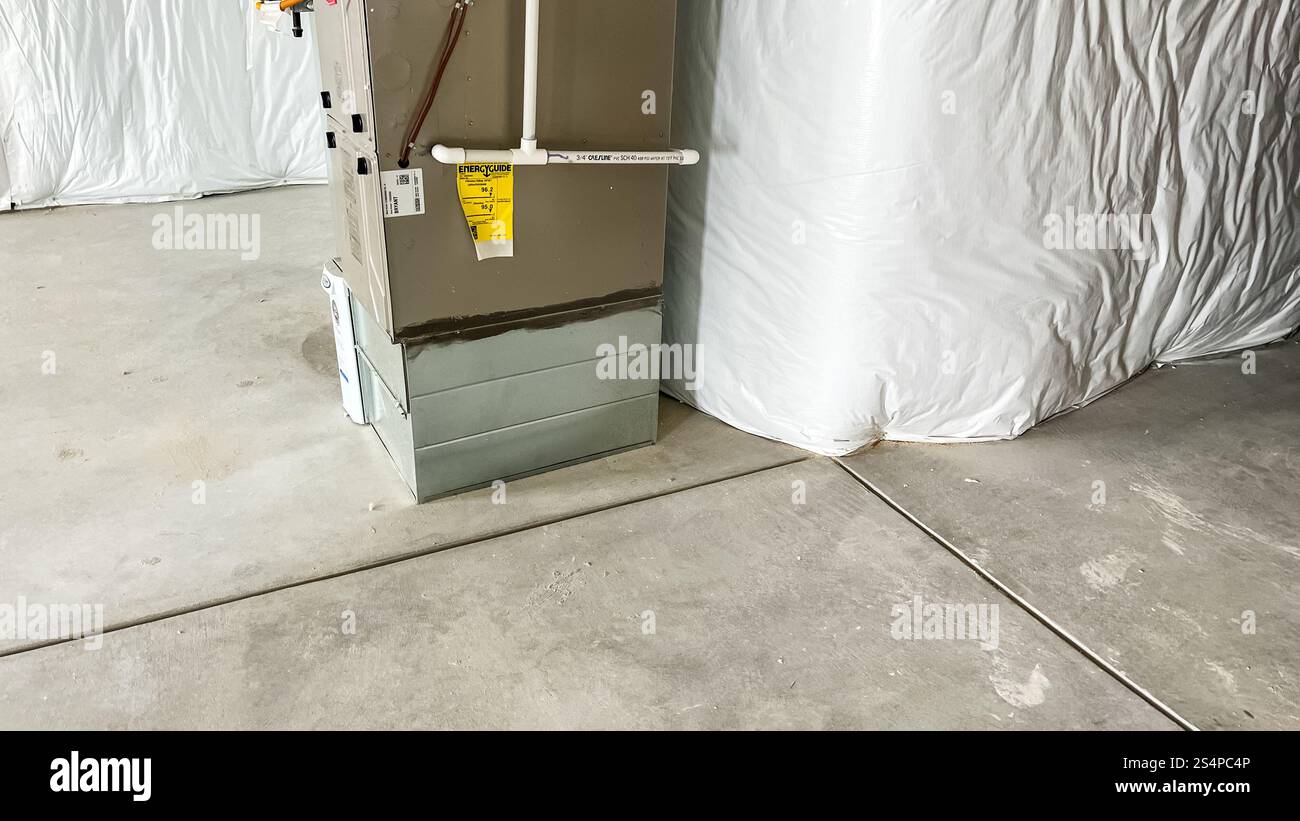 Furnace and Insulated Basement in New Home Construction Stock Photo - Alamy