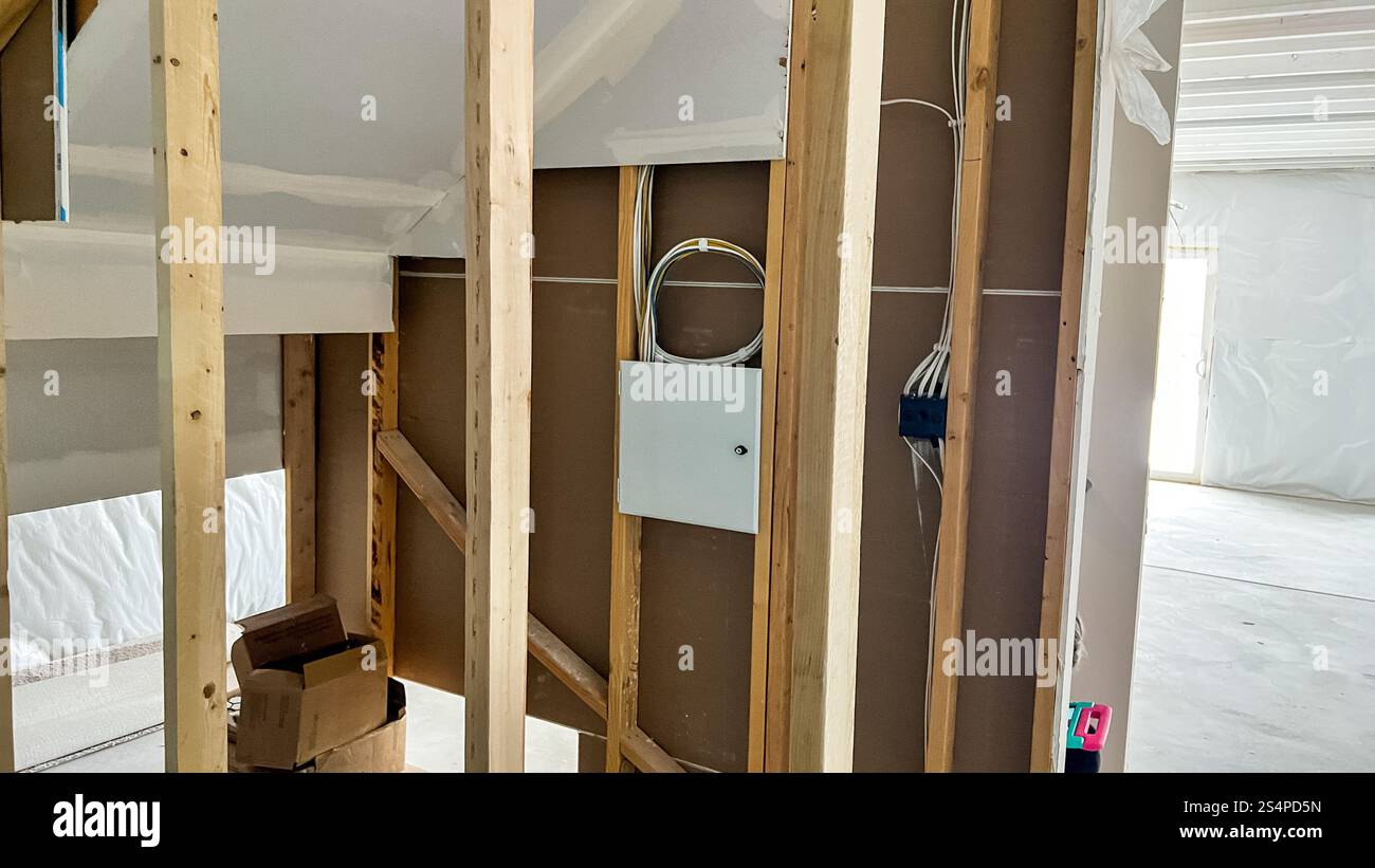 Electrical Panel Installation in Unfinished Basement Stock Photo - Alamy