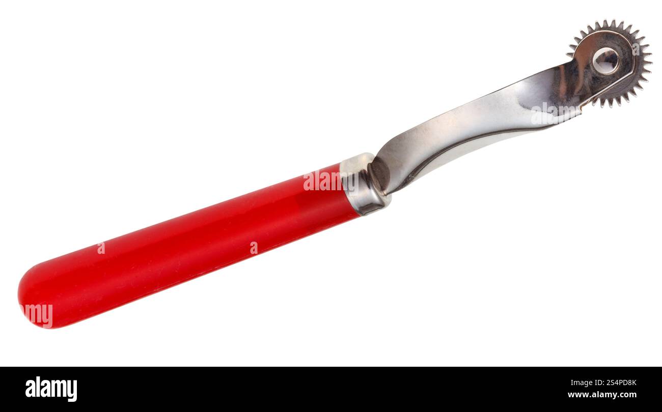 sewing tracing wheel isolated on white background Stock Photo - Alamy