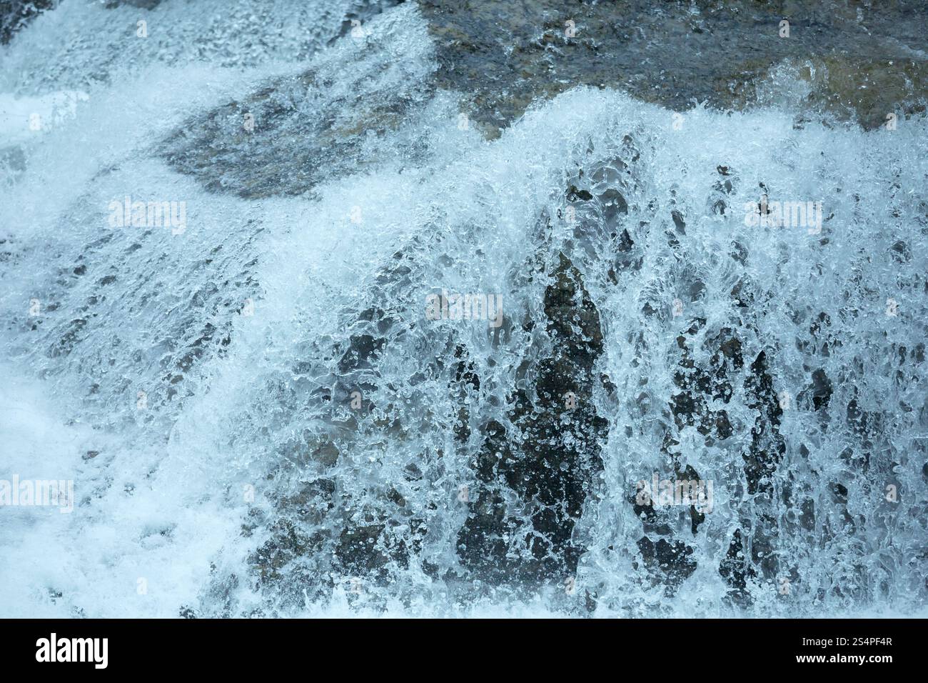 Bubbling stream of water closeup (nature background Stock Photo - Alamy