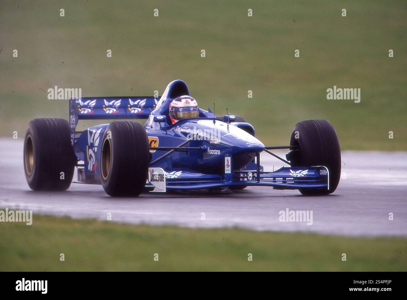 Italian motorsports racing driver Jarno Trulli on Prost Benetton F1 car ...