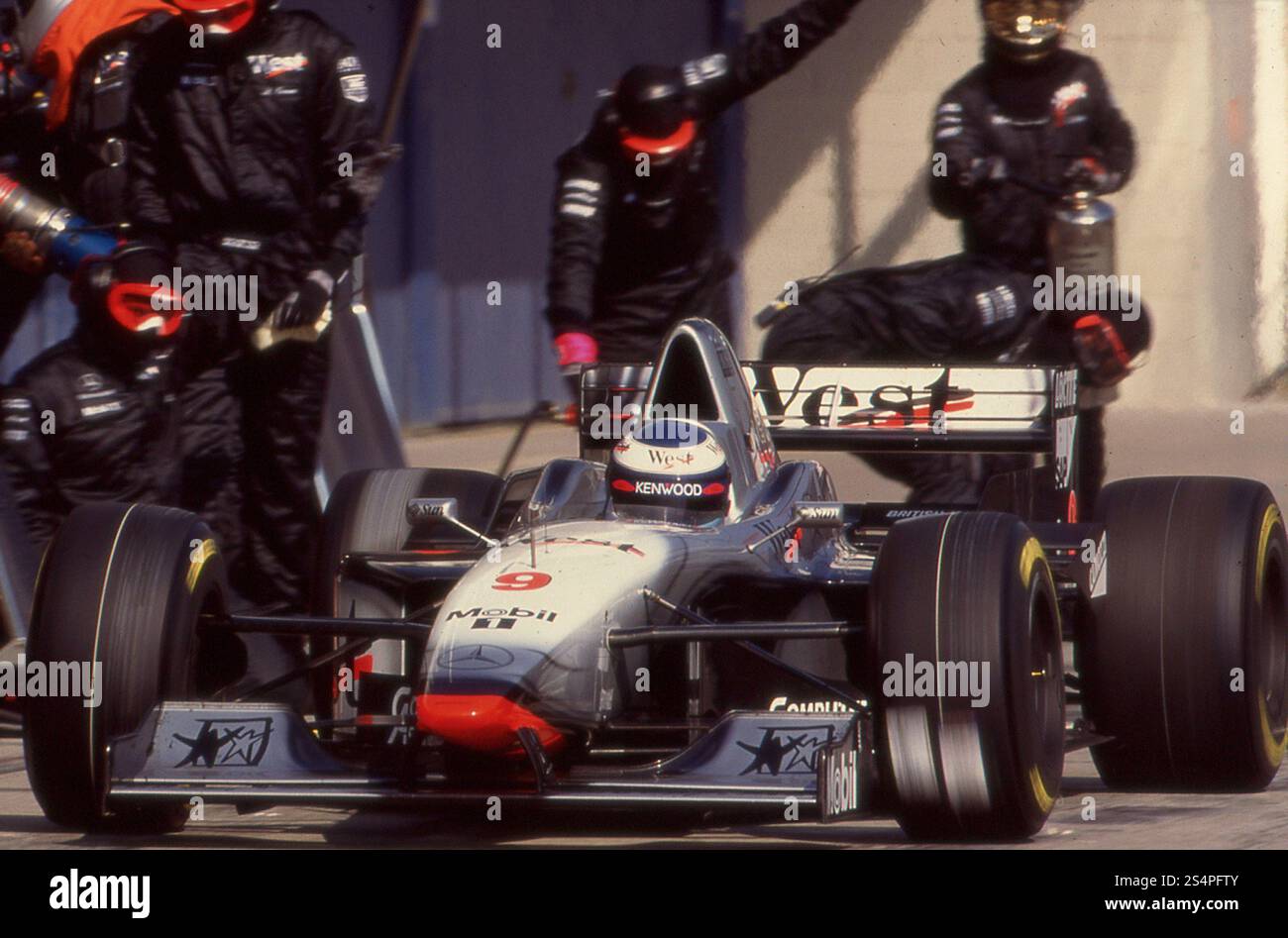 Finnish F1 racing driver Mika Hakkinen on McLaren Mercedes, 1997 Stock ...