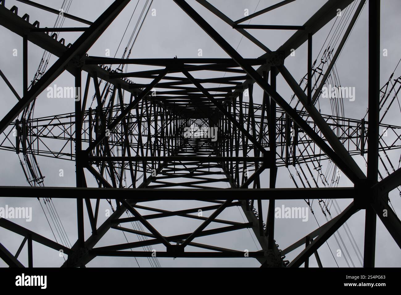 high voltage tower bottom view.jpg Stock Photo - Alamy