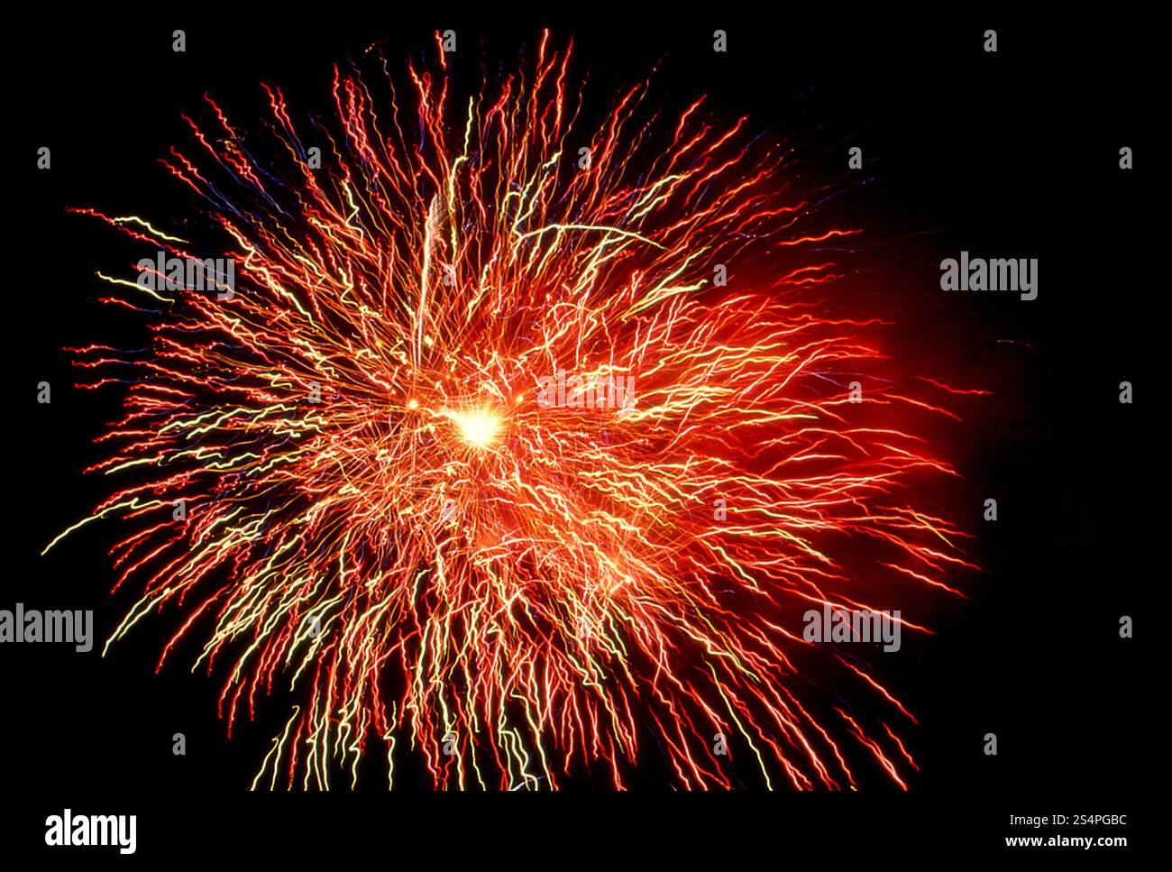 Firework explosion in the night sky Stock Photo - Alamy