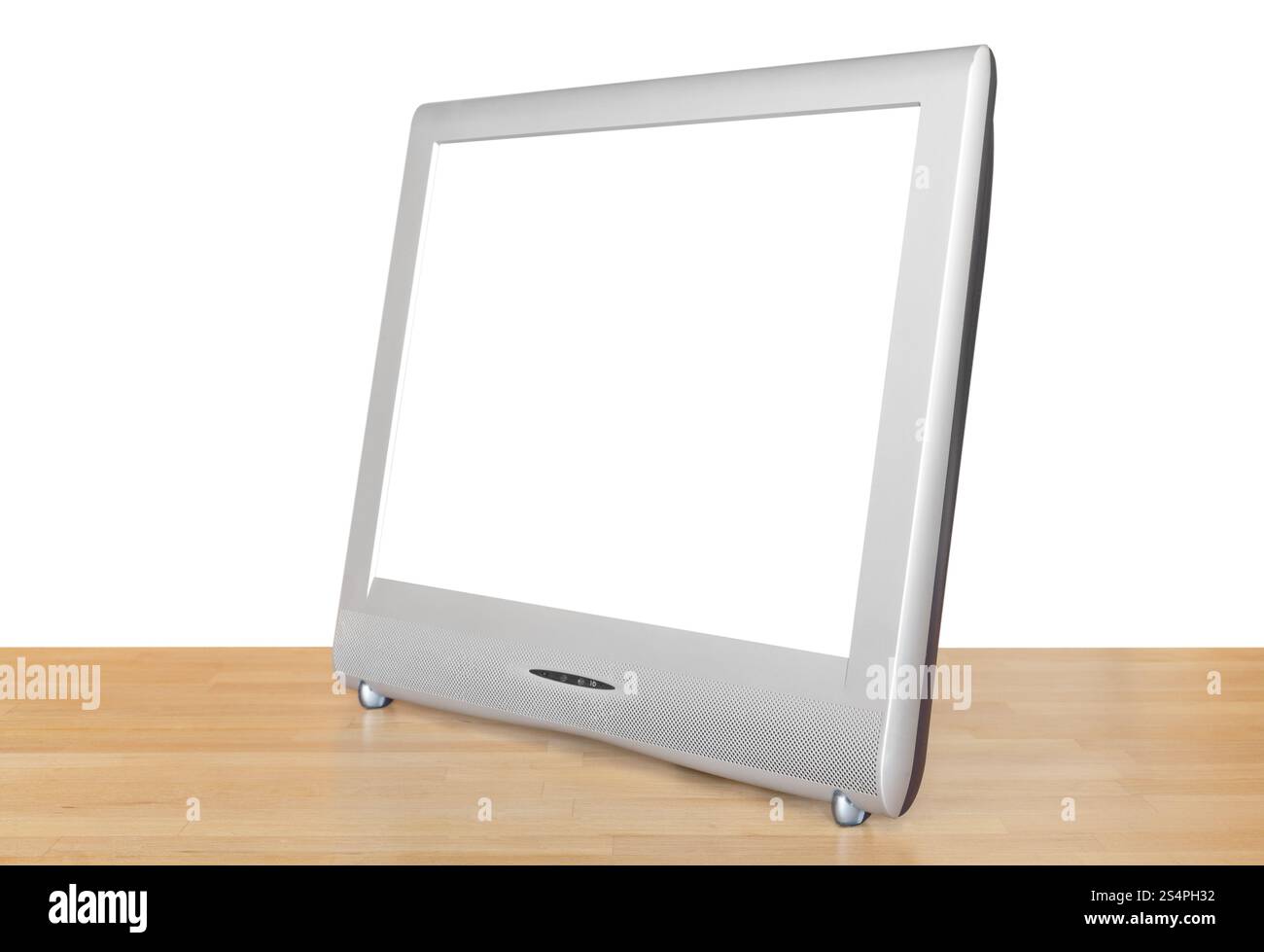 side view of silver TV set display with cut out screen on wooden table ...